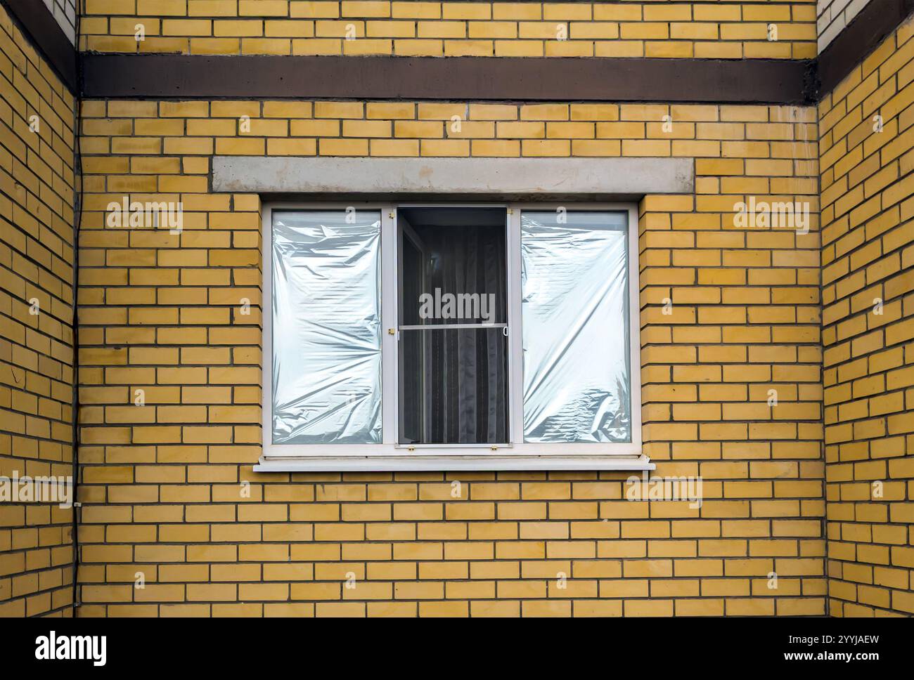 Residential window with reflective film applied Stock Photo - Alamy