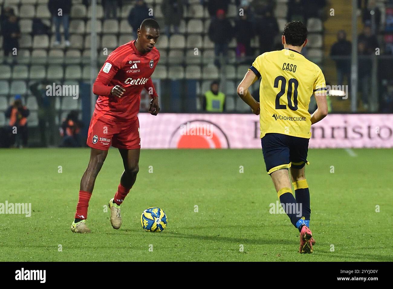 Modena, Italy. 21st Dec, 2024. Idrissa Toure' (Pisa) thwarted by ...