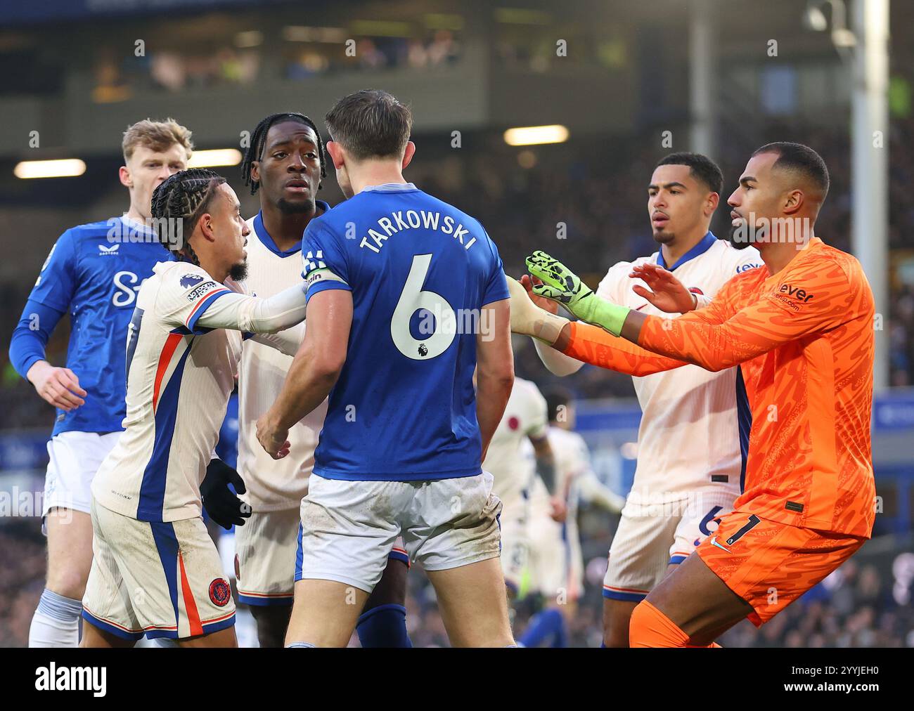 Liverpool, UK. 22nd Dec, 2024. James Tarkowski of Everton argues with ...