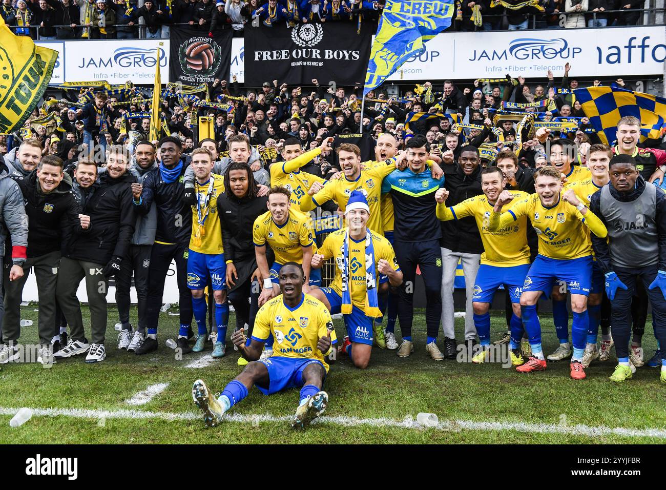 Lokeren, Belgium. 22nd Dec, 2024. SK Beveren players celebrate after ...