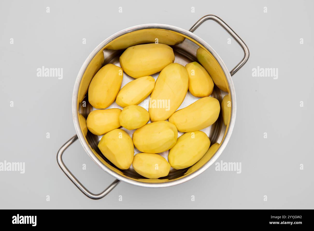 Peeled Potatoes in a Pot - Fresh Food Preparation Stock Photo - Alamy