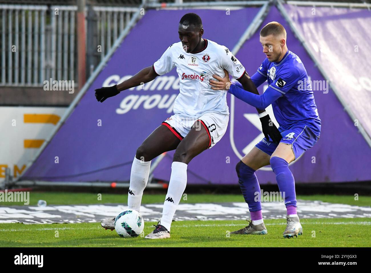Maasmechelen, Belgium. 22nd Dec, 2024. Seraing's Pape Moussa Fall and ...