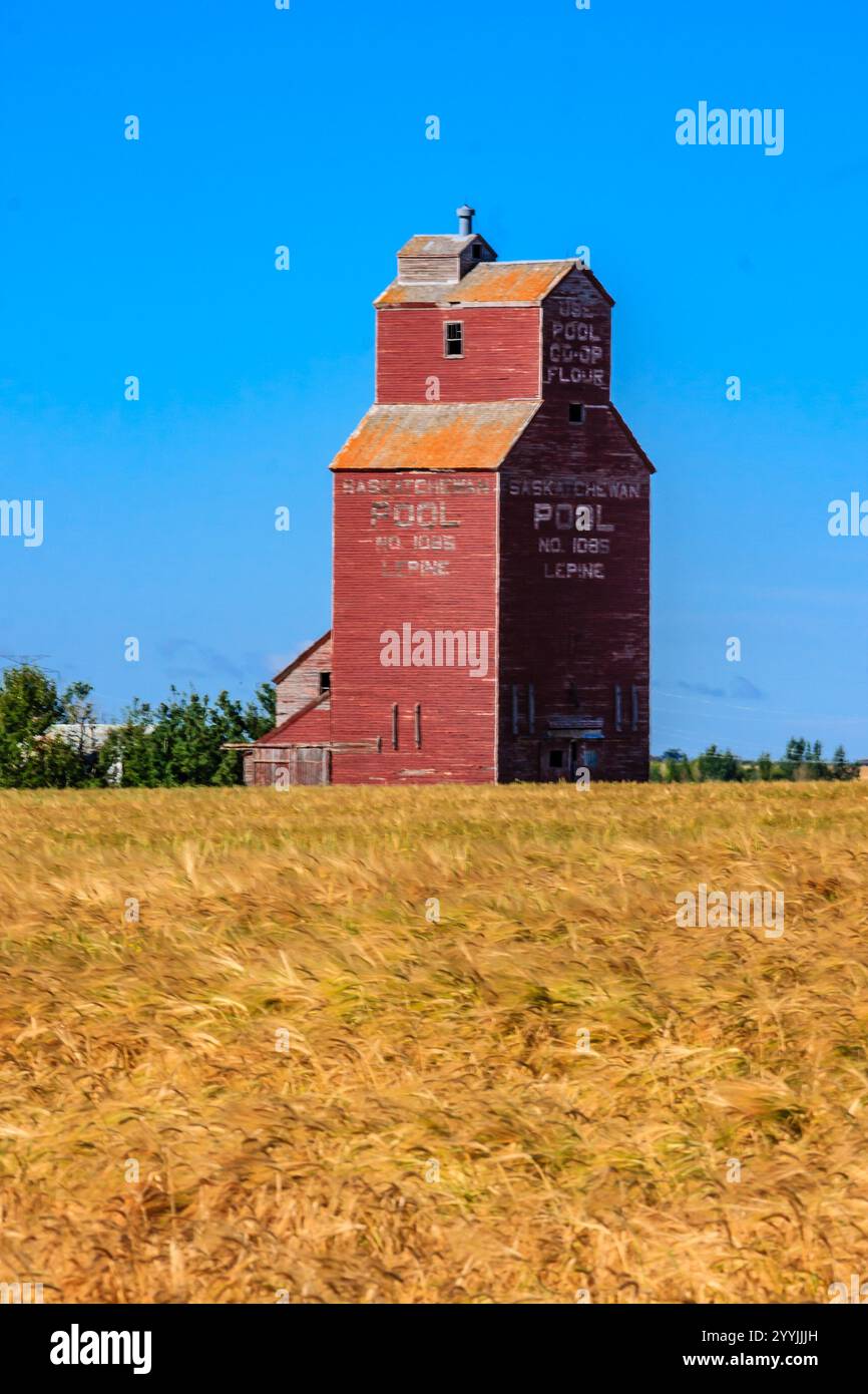 A red grain silo with the words "Pool" on the side. The silo is empty ...