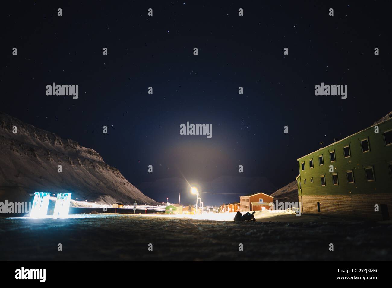 Polar night sky over city lights of Longyearbyen, Svalbard Stock Photo ...