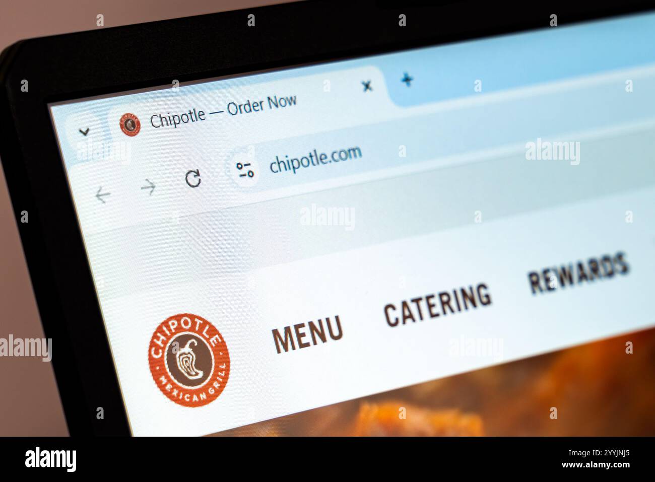 New York, USA - December 21, 2024: Chipotle website homepage displayed ...
