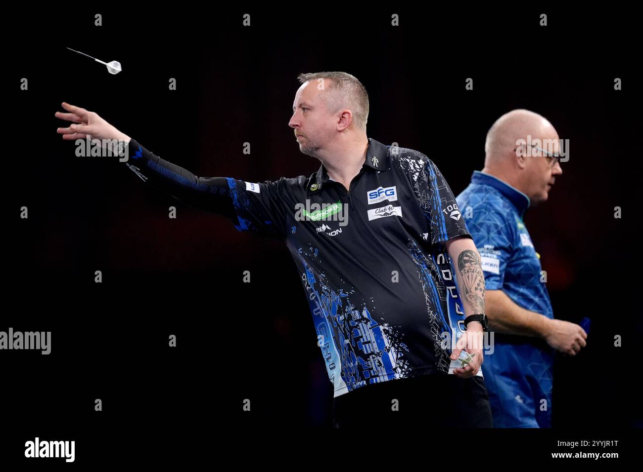 Ritchie Edhouse (centre) during his match abgainst Ian White (right) on ...