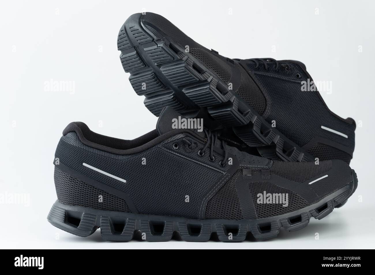 Black new light sport shoes isolated on white studio background Stock ...