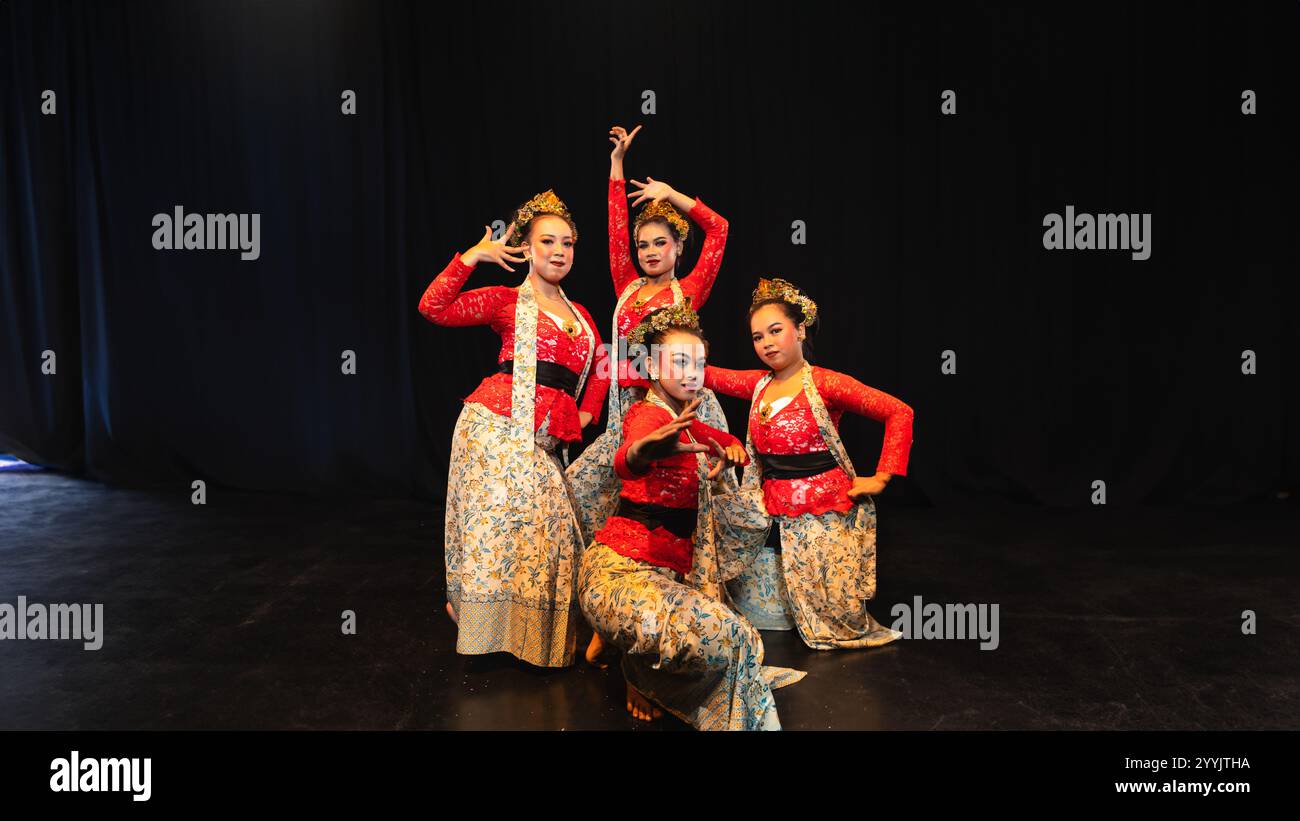 A group of traditional Sundanese dancers radiate elegant charm to the ...