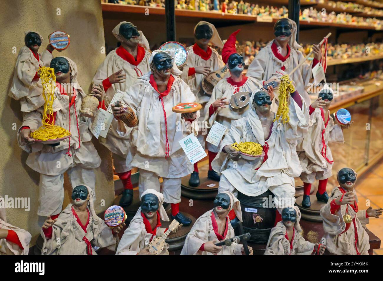 Naples, Italy - December 12, 2024: Handcrafted figurines depicting the ...