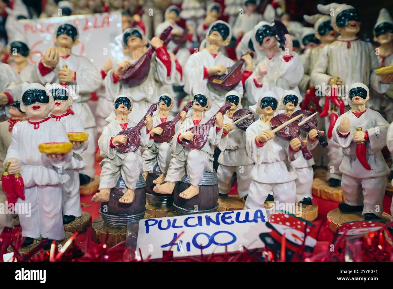 Naples, Italy - December 12, 2024: Handcrafted figurines depicting the ...