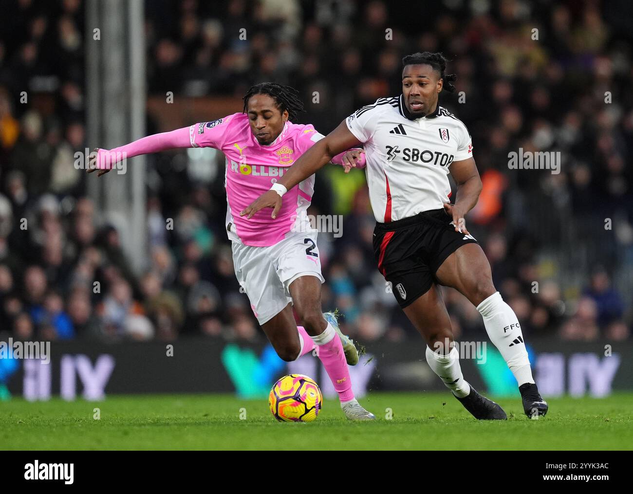 Fulham’s Adama Traore in action against Southampton's Kyle Walker ...