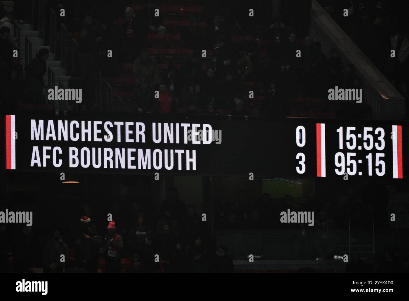 Manchester, UK. 22nd Dec, 2024. The full time score is displayed on the ...