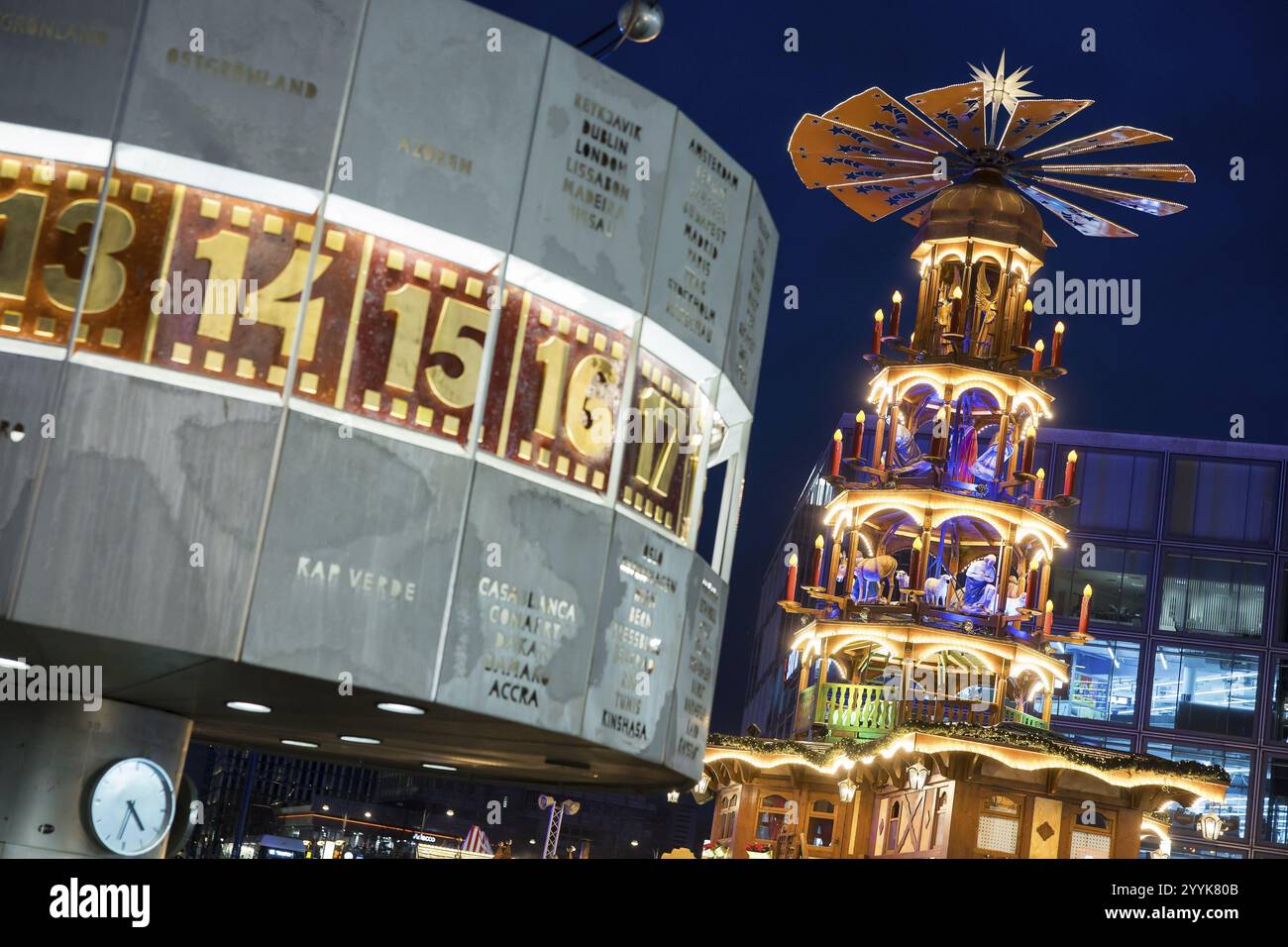 A Christmas pyramid behind the World Time Clock at the Christmas market ...
