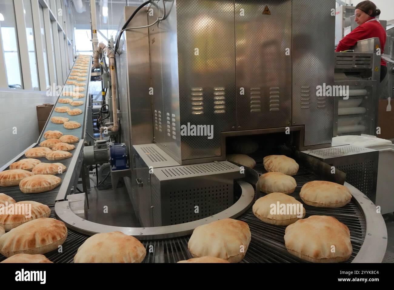 Fresh pita bread is made at the Adonis grocery store in Mississauga ...