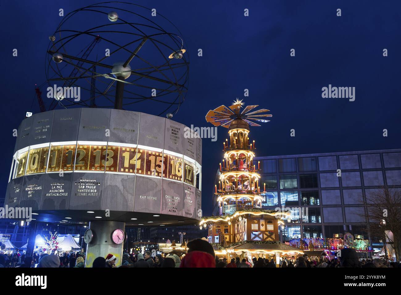 A Christmas pyramid behind the World Time Clock at the Christmas market ...