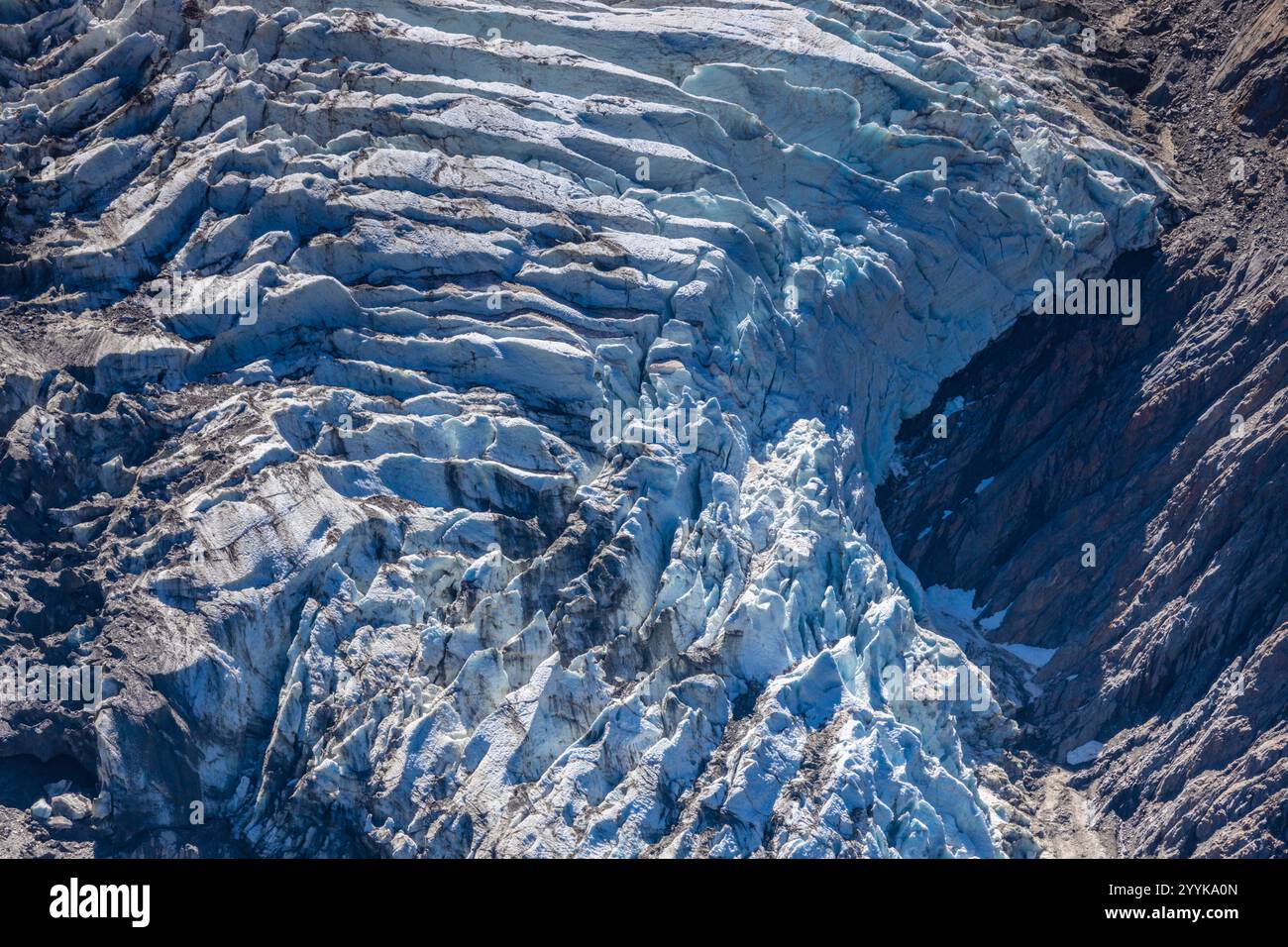 Glacier le Bossons in the French Alps, Chamonix valley, Montblanc. The glacier crevasse and huge ...
