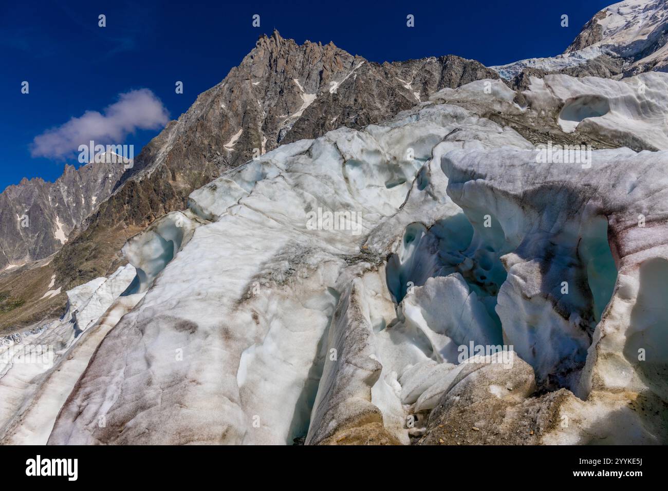 Glacier le Bossons in the French Alps, Chamonix valley, Montblanc. The glacier crevasse and huge ...