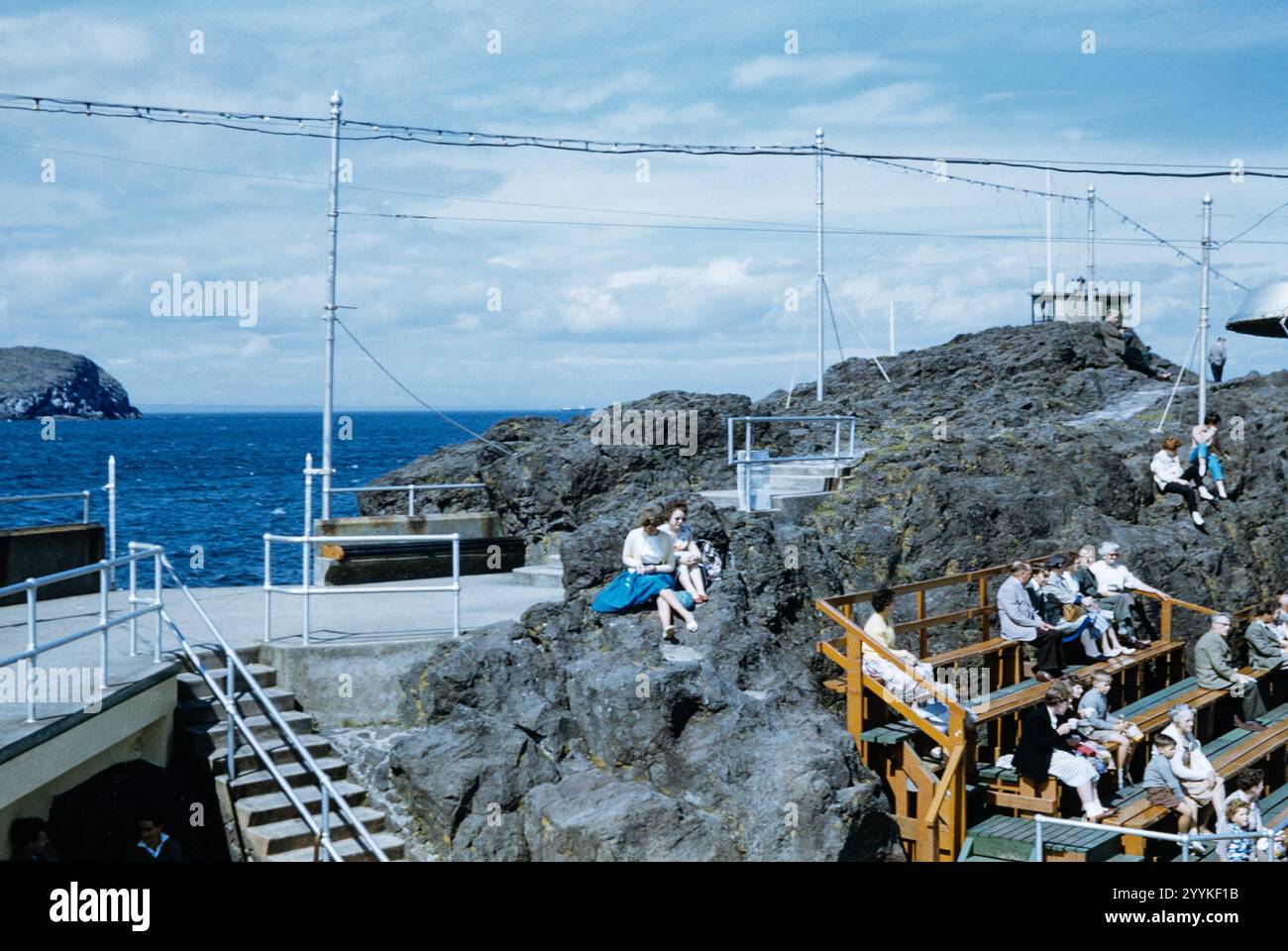 Historical photo of people sitting in the viewing and seating stands at ...
