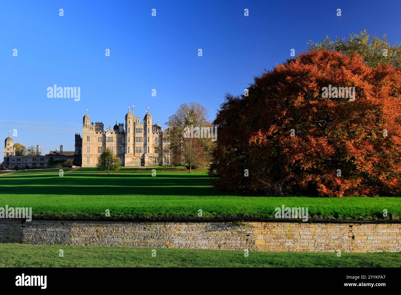 Autumn colours looking at the Golden gate and west front of Burghley ...