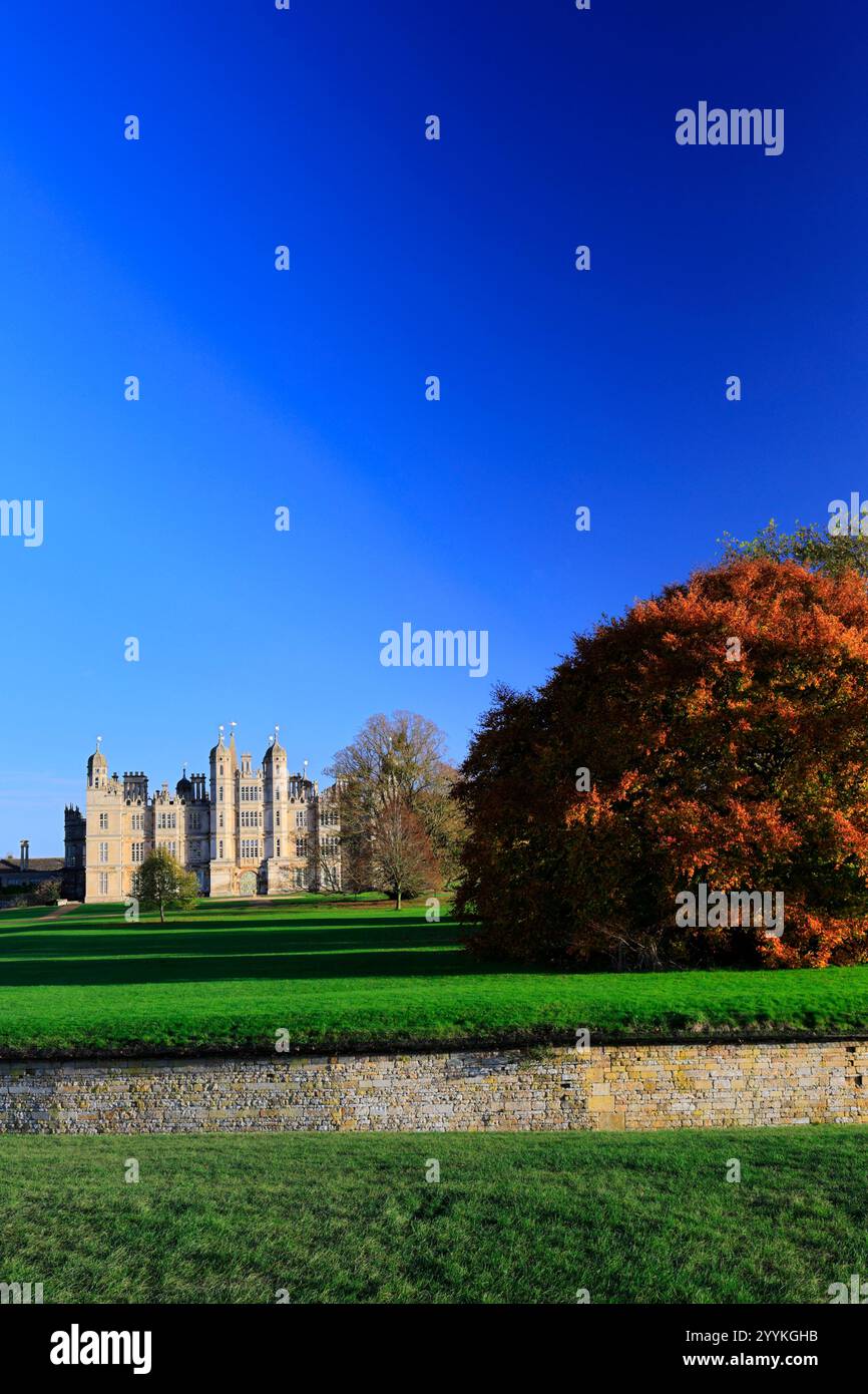 Autumn colours looking at the Golden gate and west front of Burghley ...