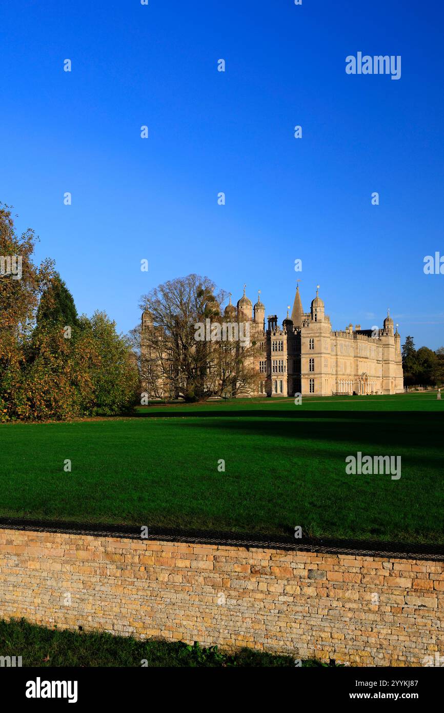 Autumn colours looking at the Golden gate and west front of Burghley ...