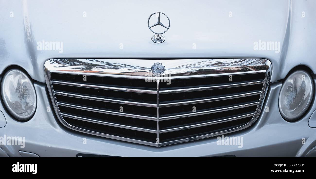 Close up Mercedes Benz logo and car's grille. front view. Concept for Mercedes Benz car market ...