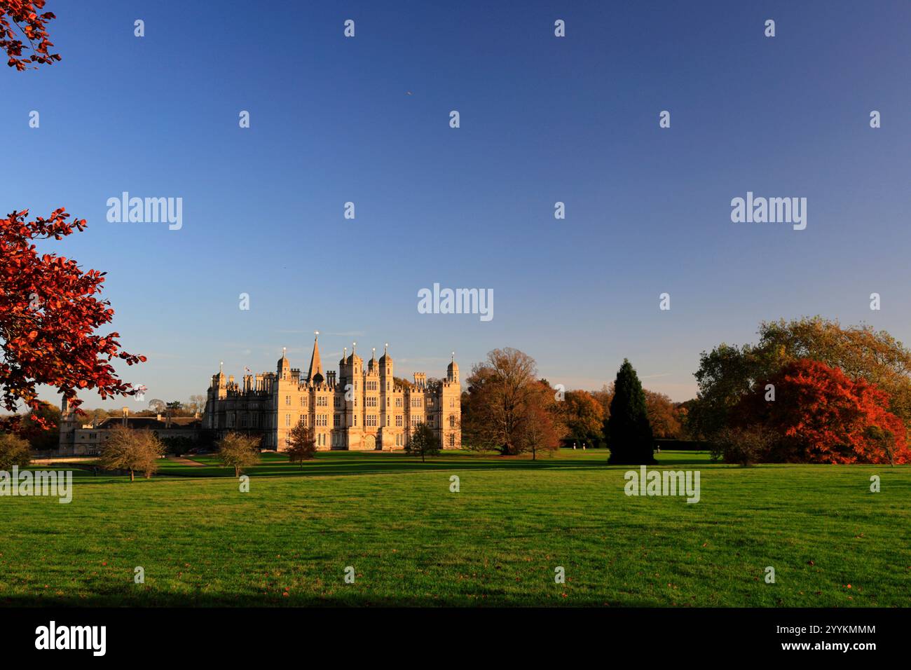 Autumn colours looking at the Golden gate and west front of Burghley ...