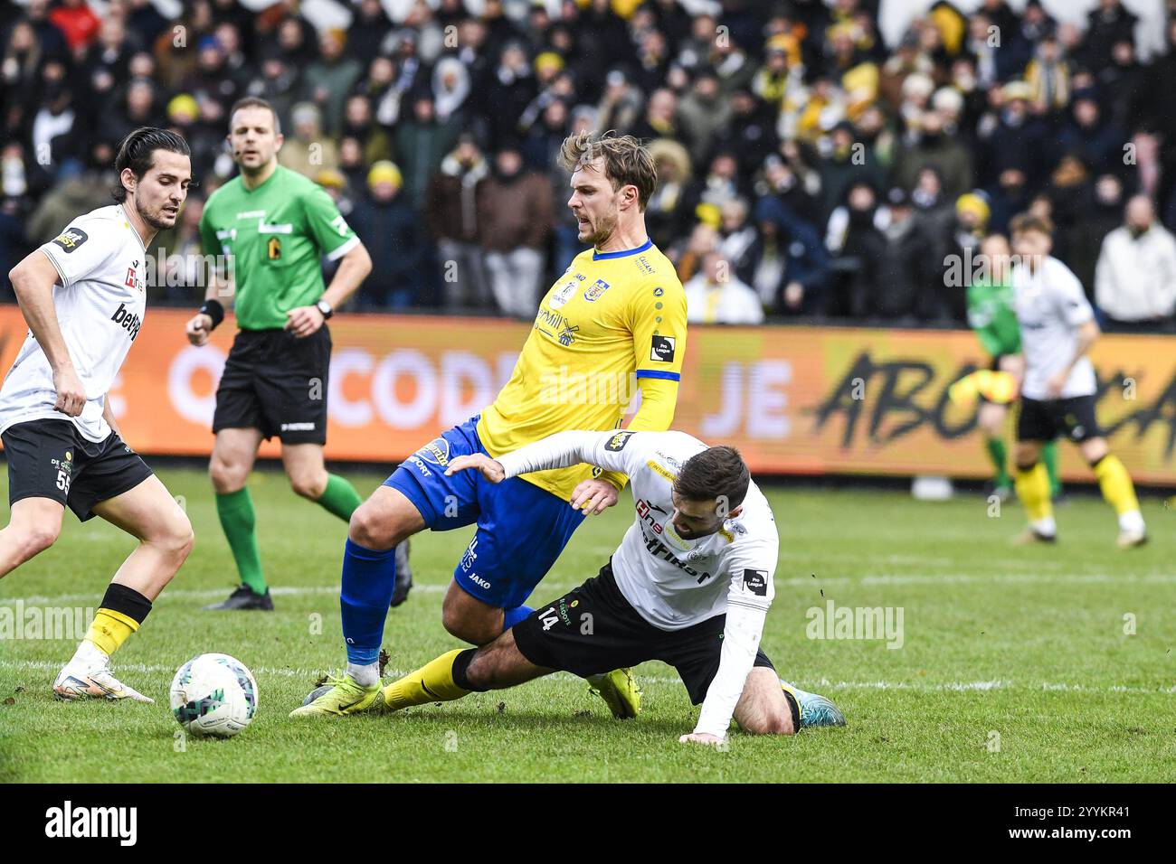 Lokeren, Belgium. 22nd Dec, 2024. Beveren's Lennart Mertens and Lokeren ...