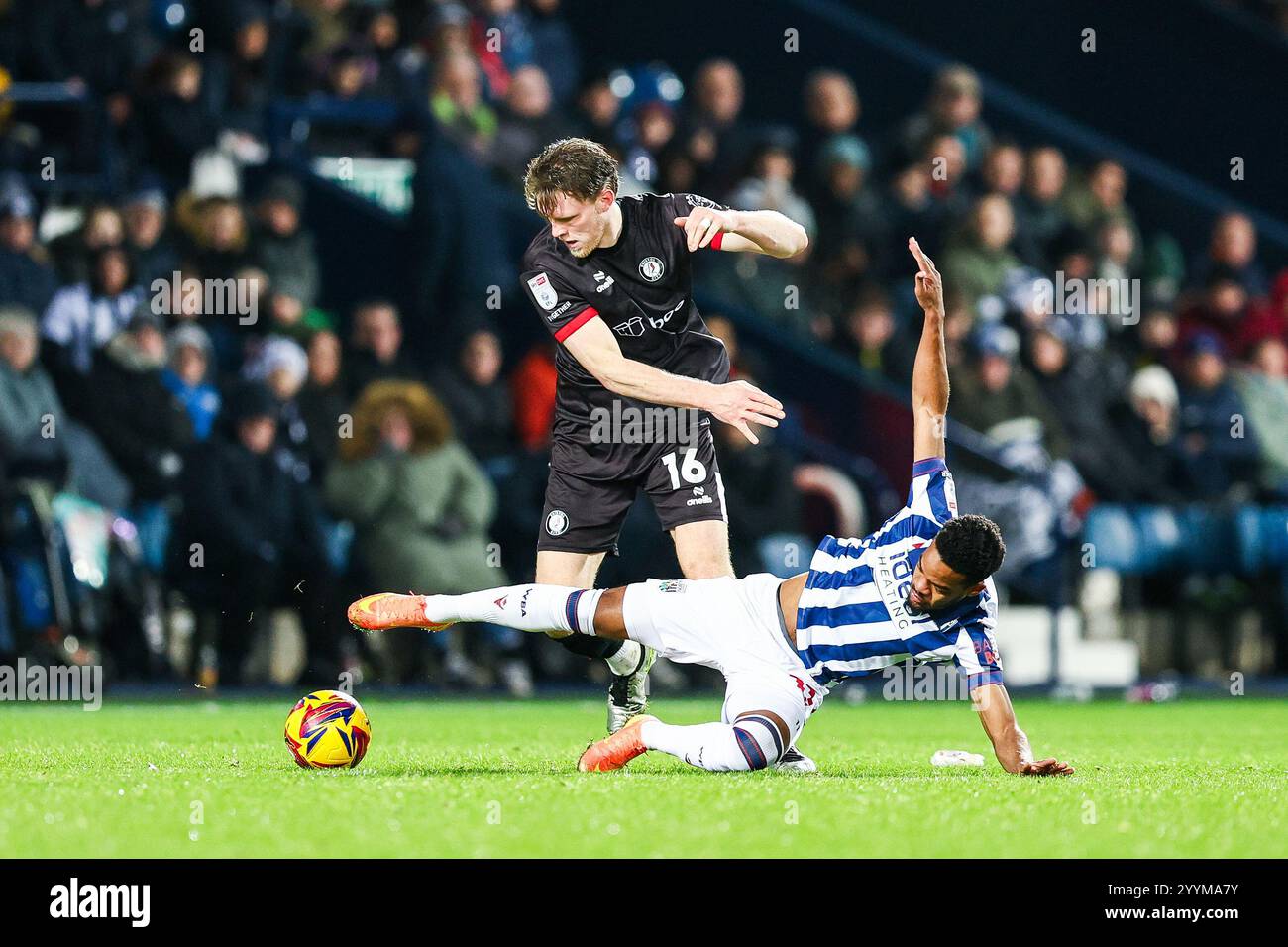#16, Rob Dickie of Bristol City forces #2, Darnell Furlong of WBA down ...