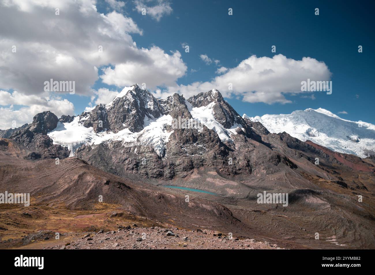 Breathtaking vista of snow-capped peaks towering over a turquoise ...