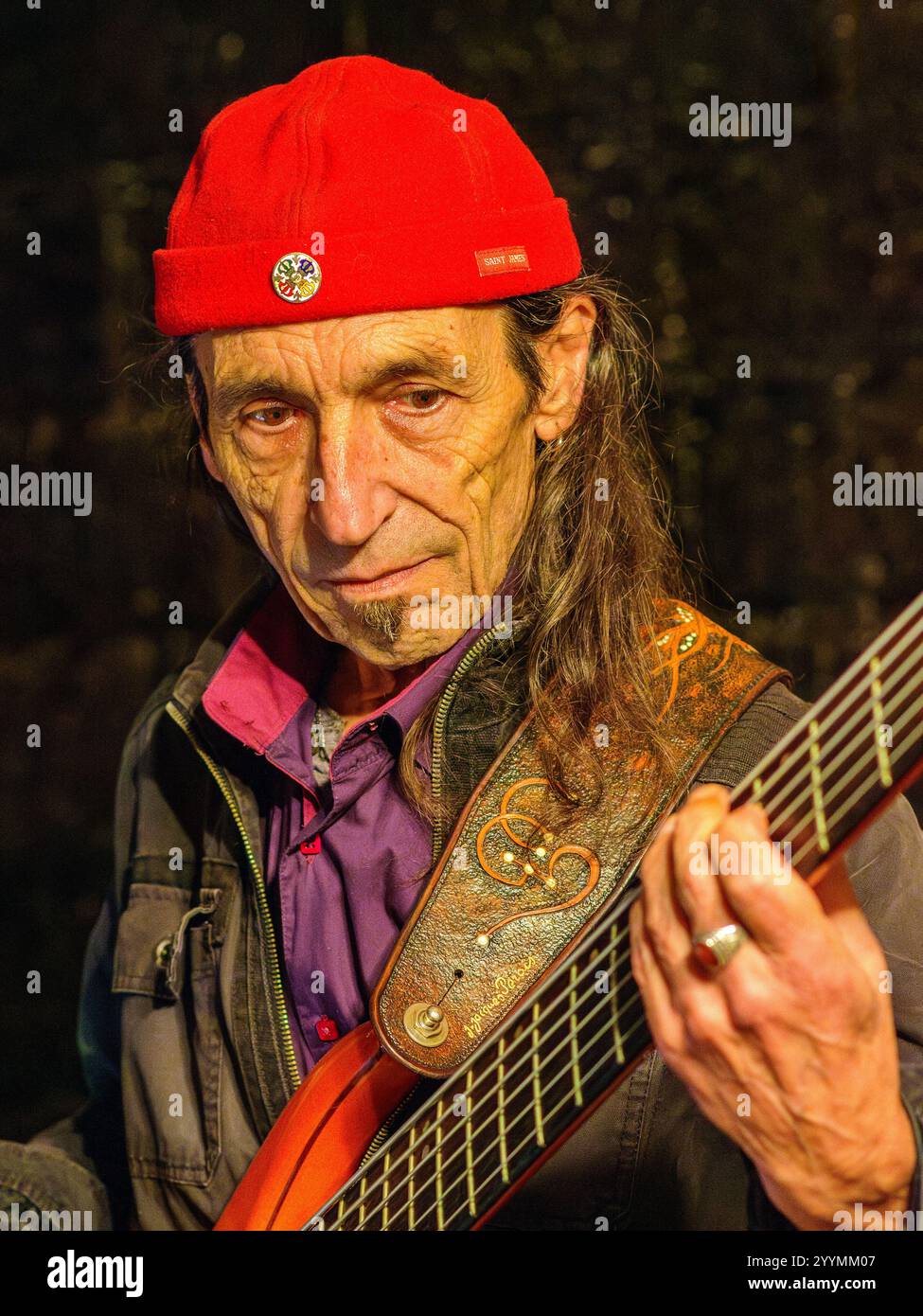 French musician and singer Sacha Gardèr playing a James Trussart ...