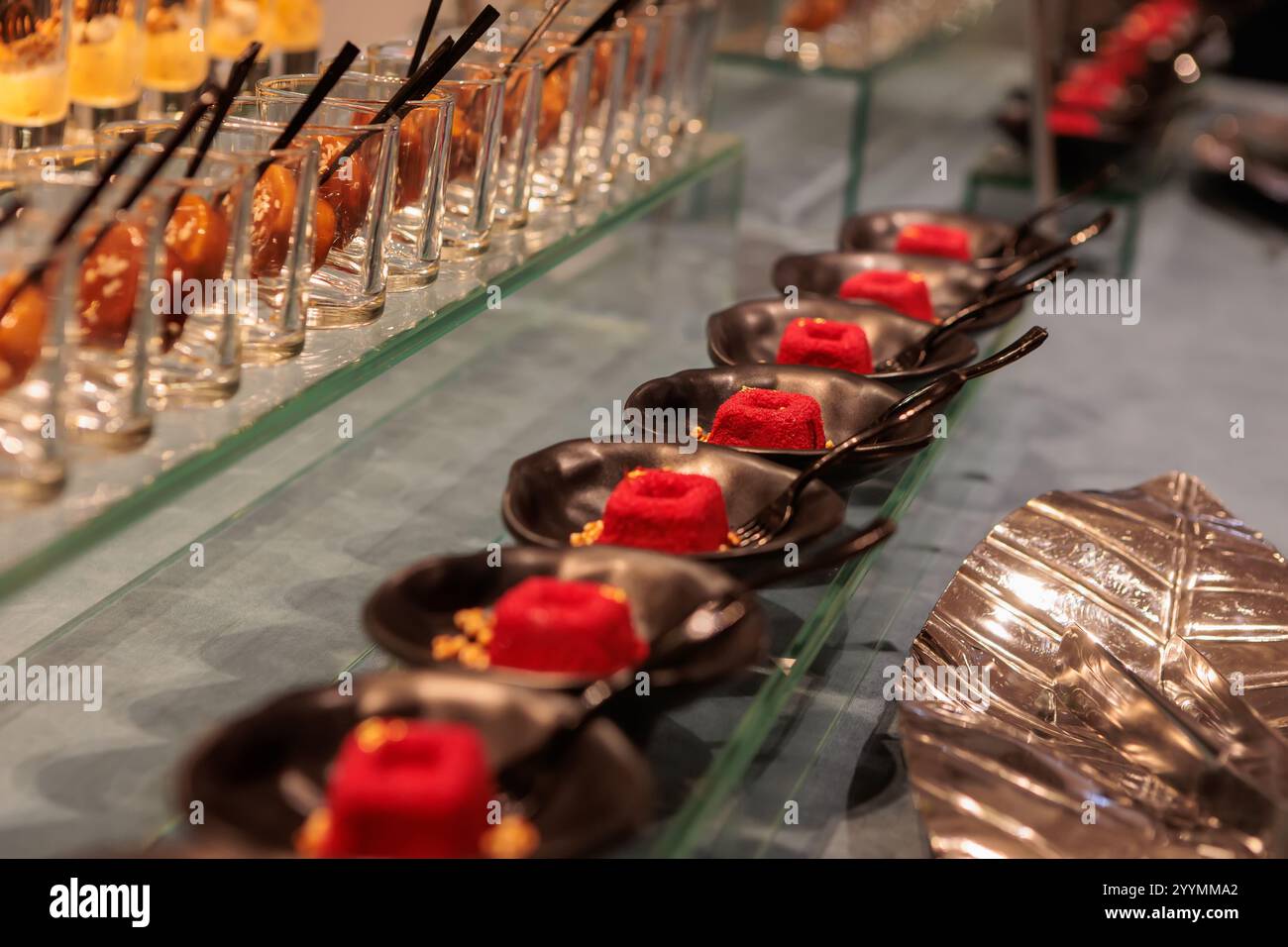 Delicious mini red velvet cakes with cream cheese frosting and grated ...