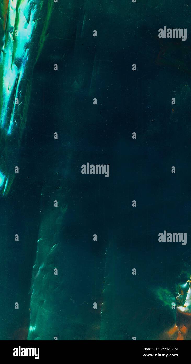 Distressed foil texture. Dust scratch overlay. Green orange color light ...