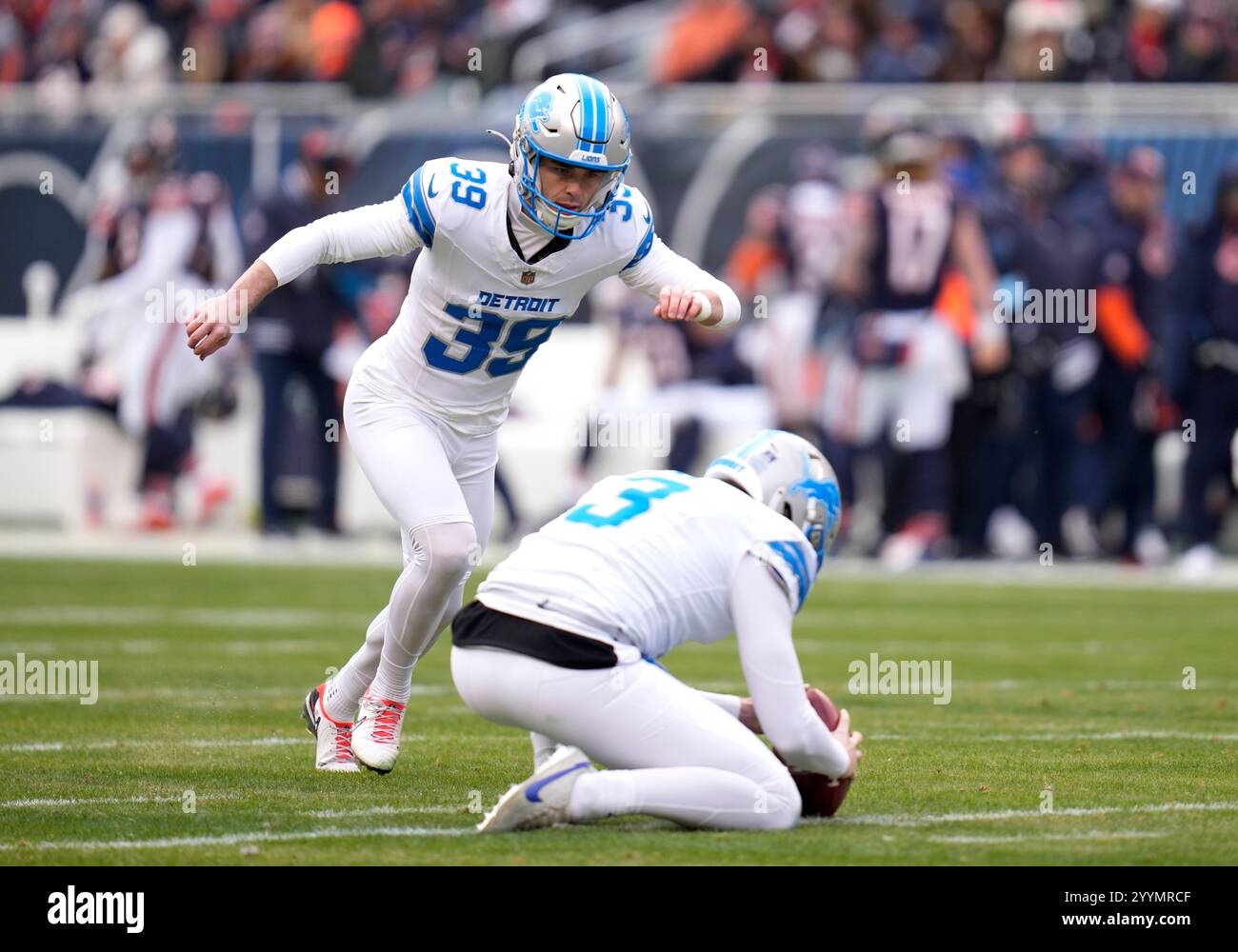 Detroit Lions place kicker Jake Bates (39) steps into a field goal off ...