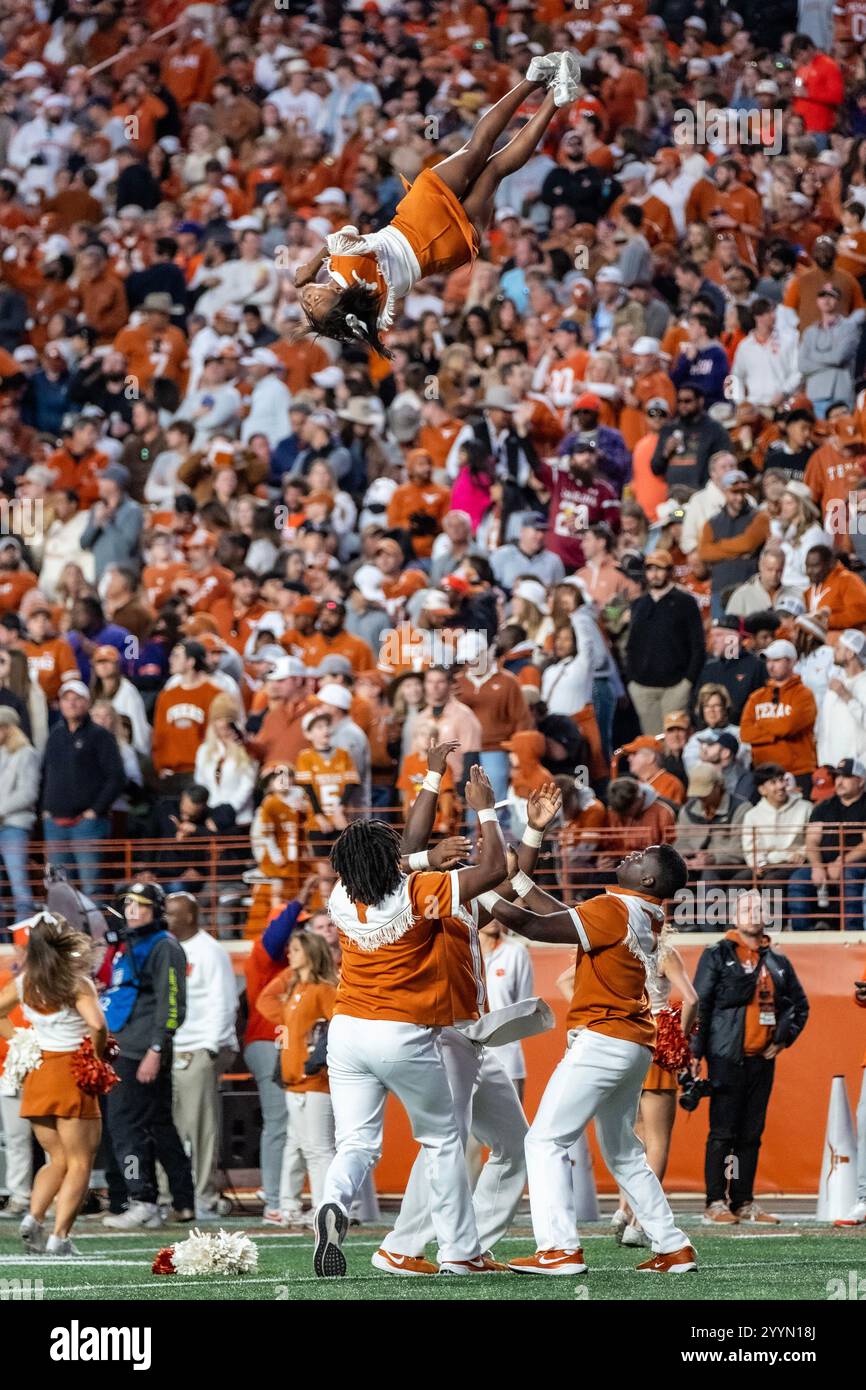 Dec 21, 2024.A cheerleader of the Texas Longhorns in action vs the Clemson Tigers in the first ...