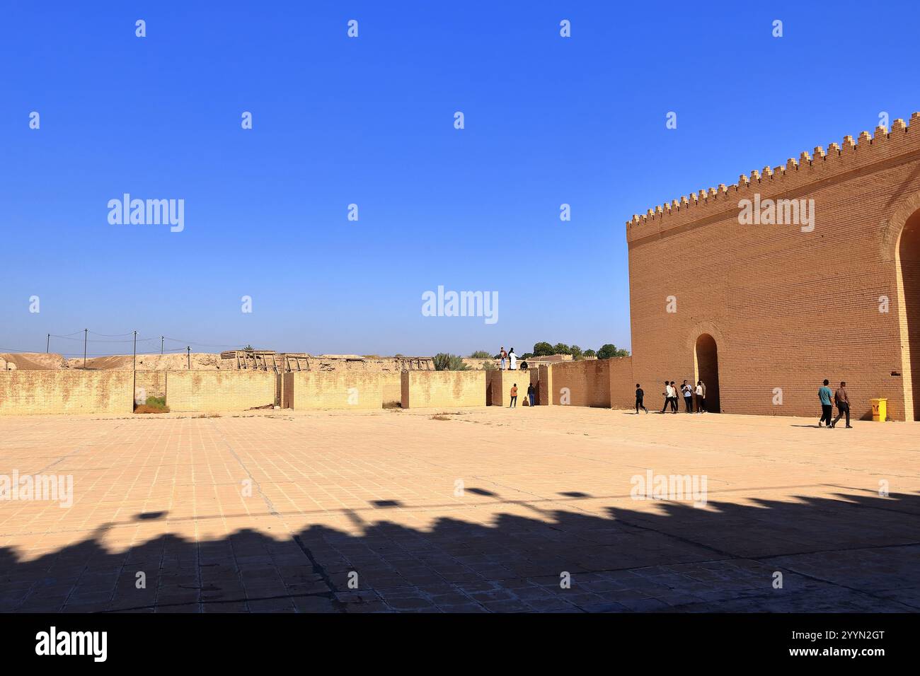 Babylon in Iraq - November 13 2024: people visit the old walls of the ...