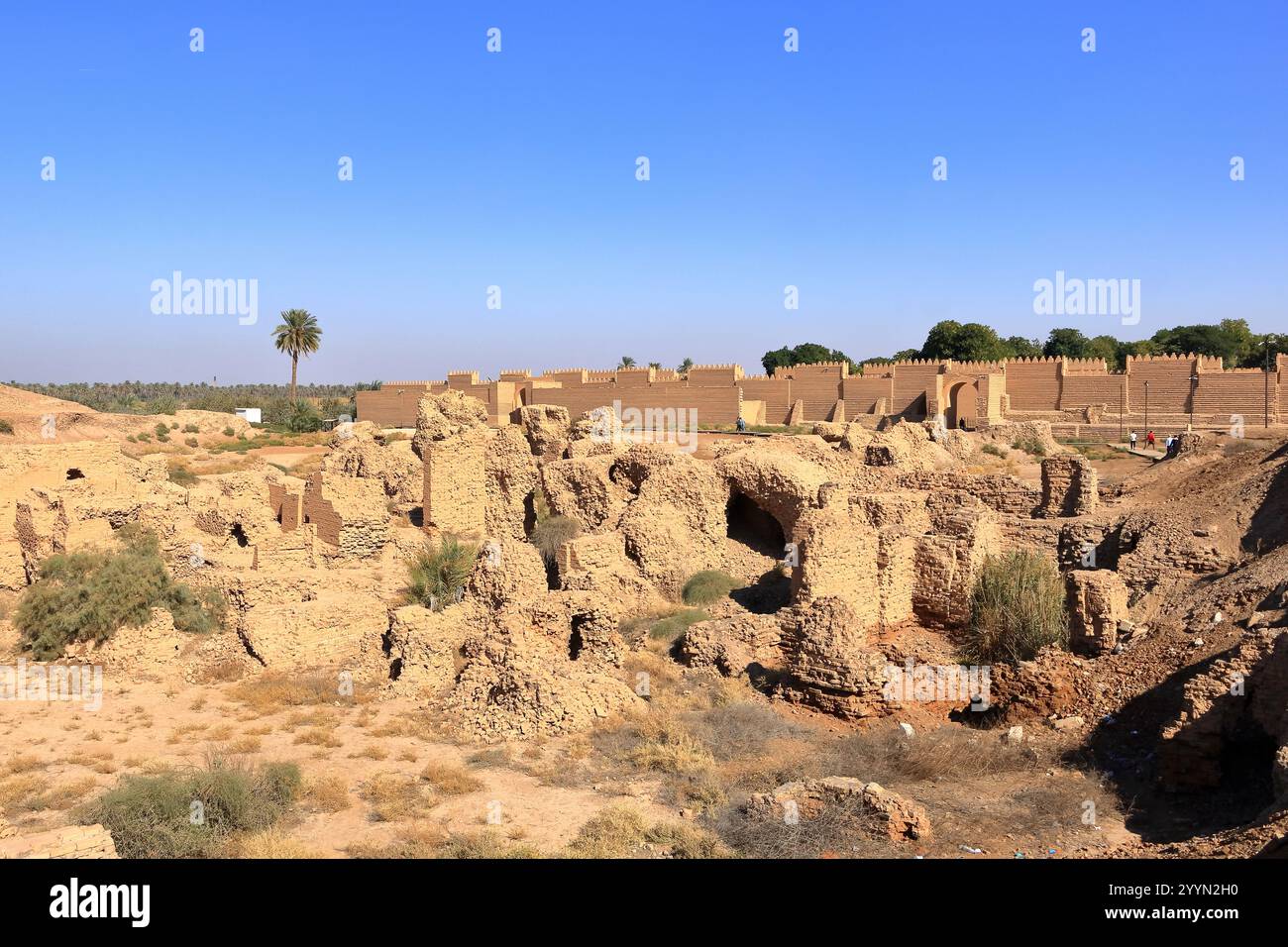 Babylon in Iraq - November 13 2024: people visit the old walls of the ...