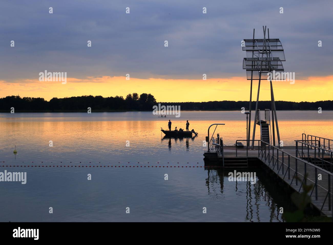 Wandlitz, Brandenburg, Germany - July 26 2024: people enjoy the sunset ...