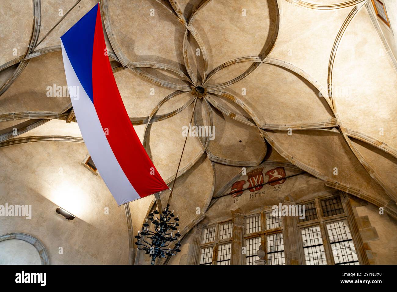 Gothic ribbed vault ceiling in Vladislav Hall, with Czech flag, inside ...