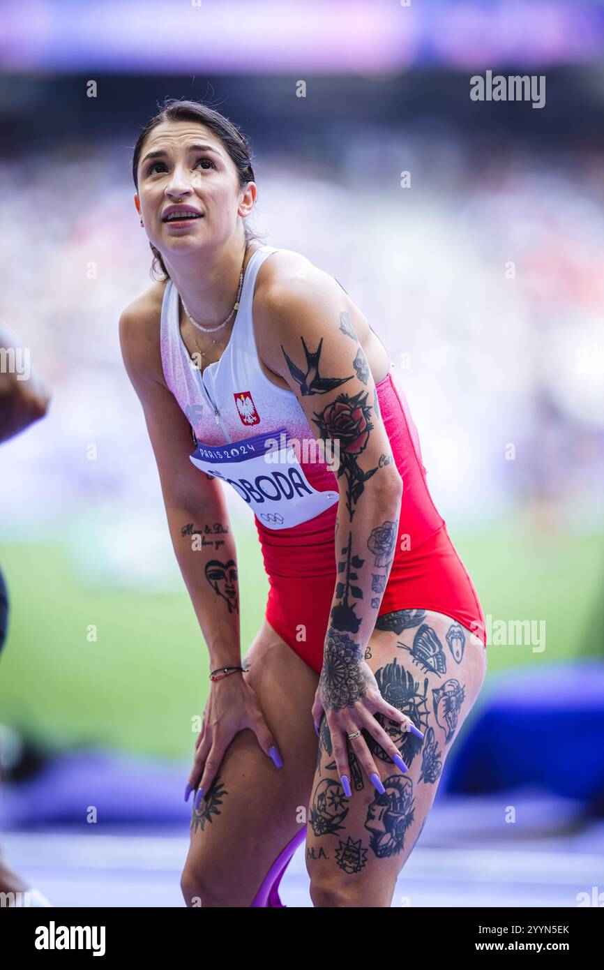Ewa Swoboda participating in the 100 meters at the Paris 2024 Olympic ...