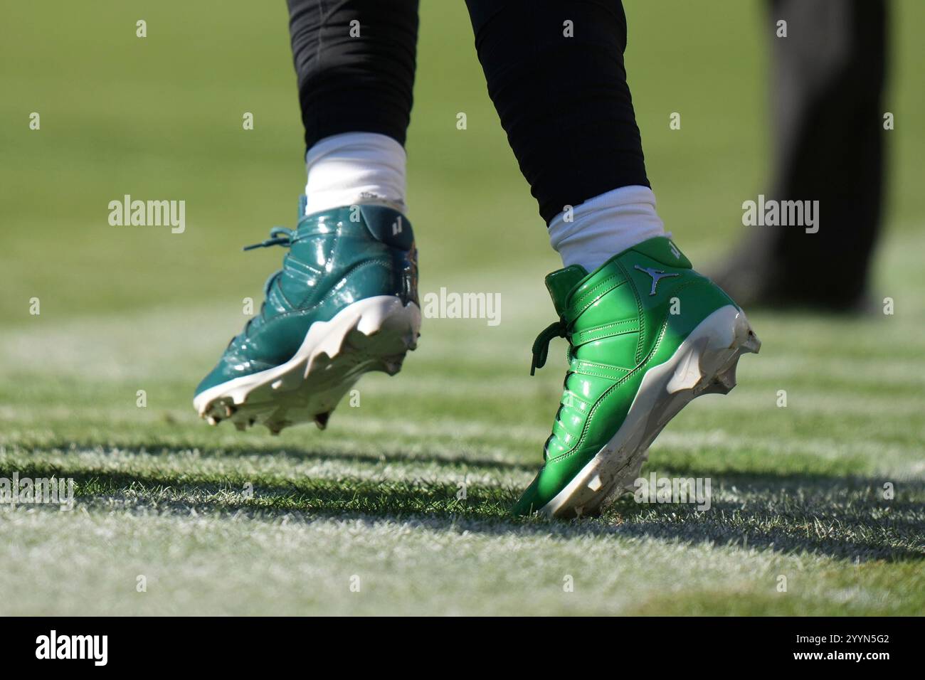 Close-up of mismatch cleats worn by Philadelphia Eagles quarterback ...