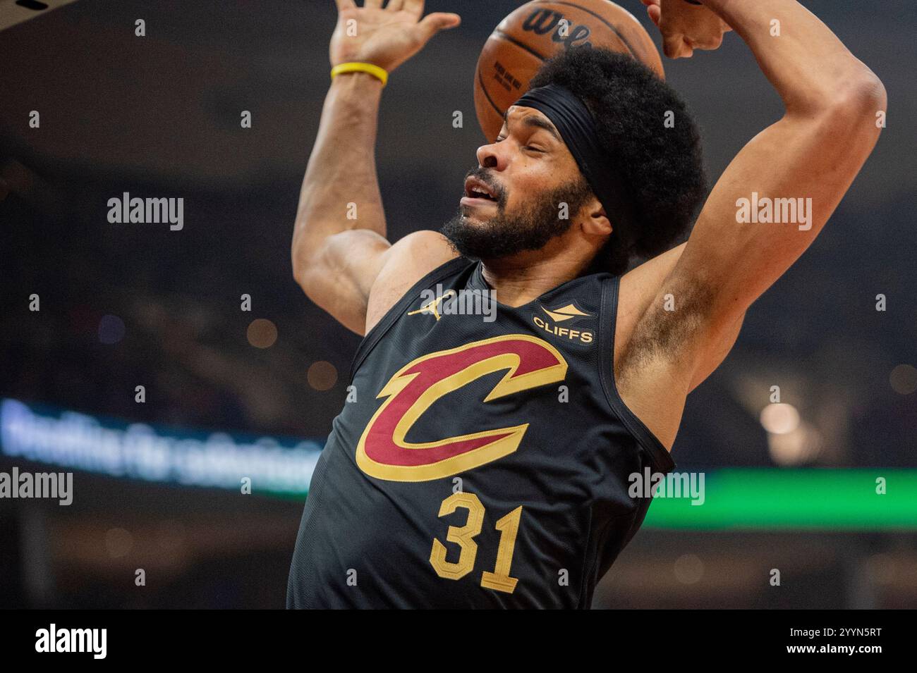 Cleveland Cavaliers' Jarrett Allen (31) finishes a dunk against the ...