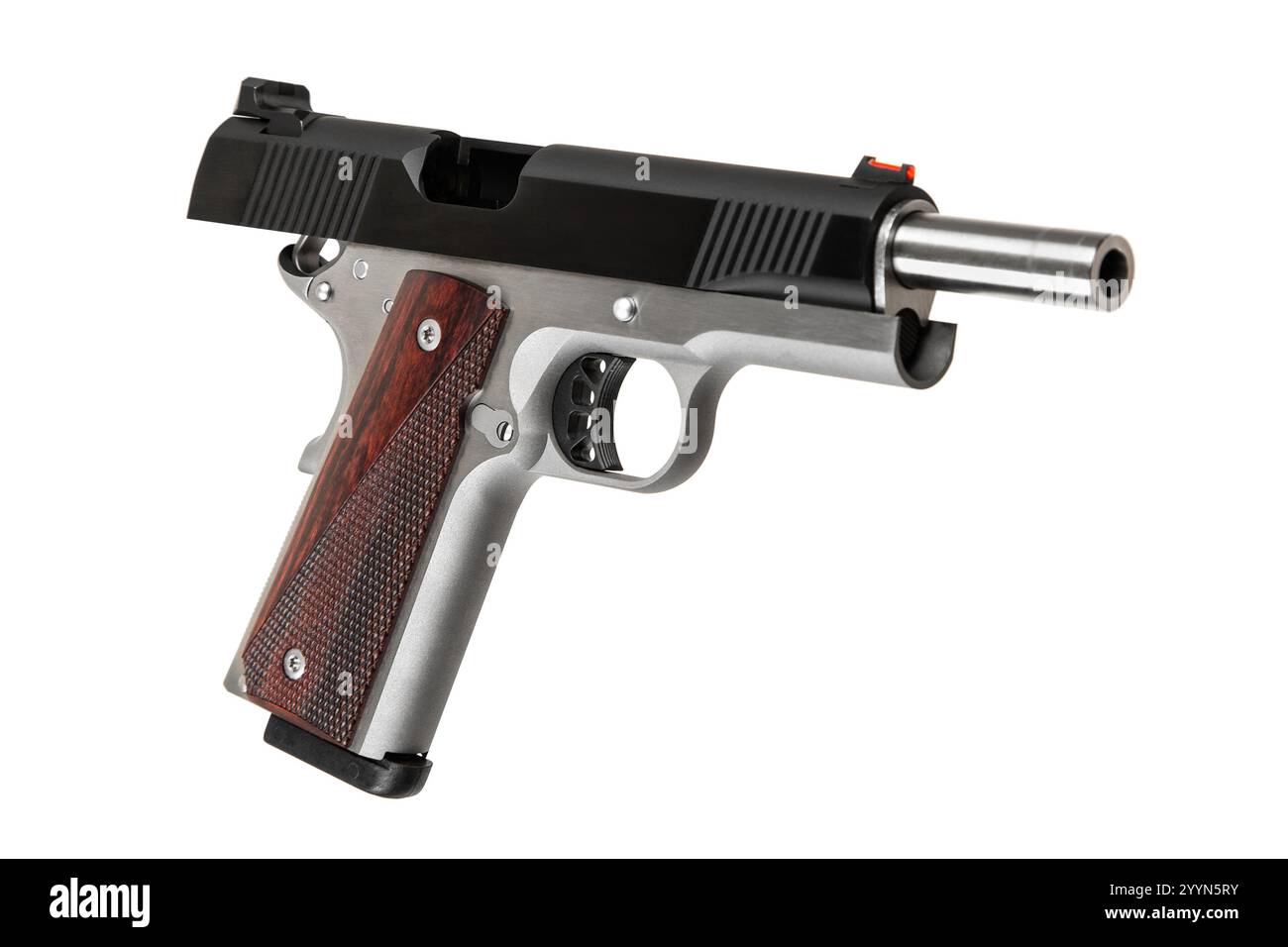 Modern semi-automatic handgun with wooden grips on a white background ...