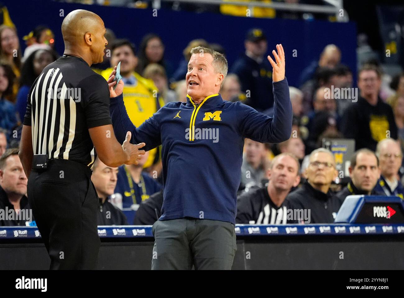 Michigan head coach Dusty May argues a call during the first half of an ...