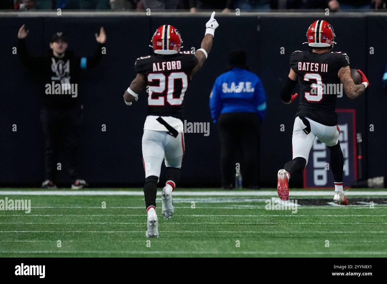Atlanta Falcons safety Jessie Bates III (3) runs the ball in for a pick ...