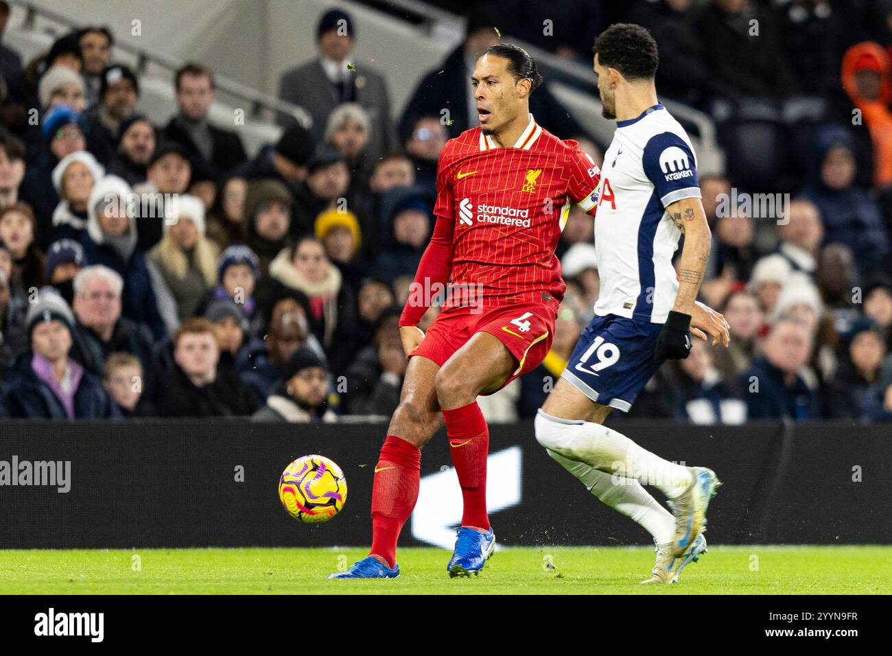 London, UK. 22nd Dec, 2024. Virgil van Dijk of Liverpool (L) in action ...