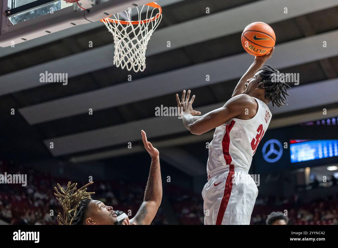 Alabama forward Derrion Reid (35) shoots over Kent State forward ...