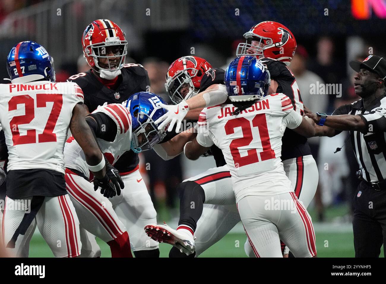 New York Giants and Atlanta Falcons fight after an interception in the ...