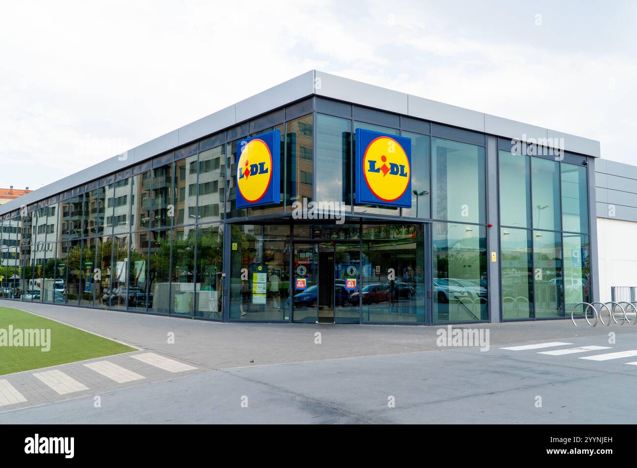 Contemporary building with Lidl European store logotype on the glass ...