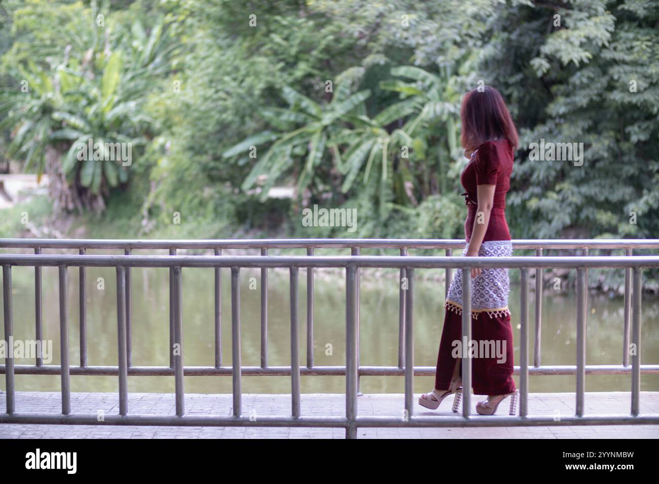 woman walking forward on the path to her intended destination and her ...